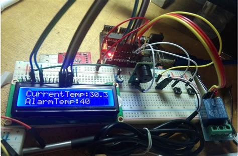 temperature detecting heating control system with arduino