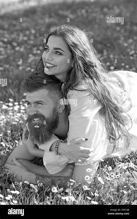Man And Woman Laying On Grass Spring Day Spring Leisure Concept