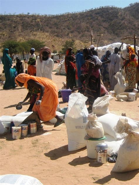 Displaced Women At Koloma In Southeastern Chad Gathering To Receive