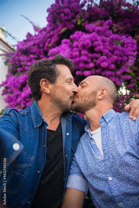 Happy Gay Couple Taking Selfie On Romantic Trip Two Men In Casual