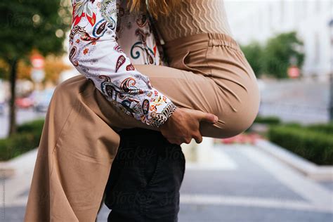Close Up Of Man Lifted His Girlfriend By Stocksy Contributor Kike