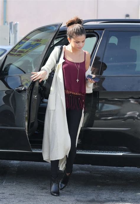 Selena Gomez Braless Wearing Skimpy Purple Top And Tights Out In Los