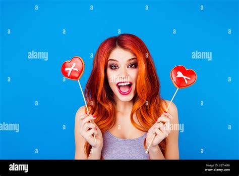 Portrait Of Stylish Funny Happy Carefree Girl With Ginger Hair Holding