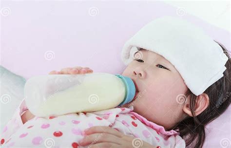 Closeup Cute Asian Girl Suck Up Milk Bottle Drinking Milk For G Stock
