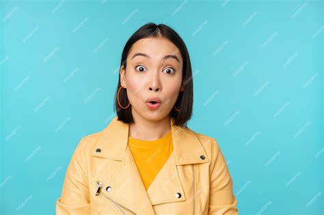 Free Photo Close Up Portrait Of Asian Girl Looks Surprised At Amazed