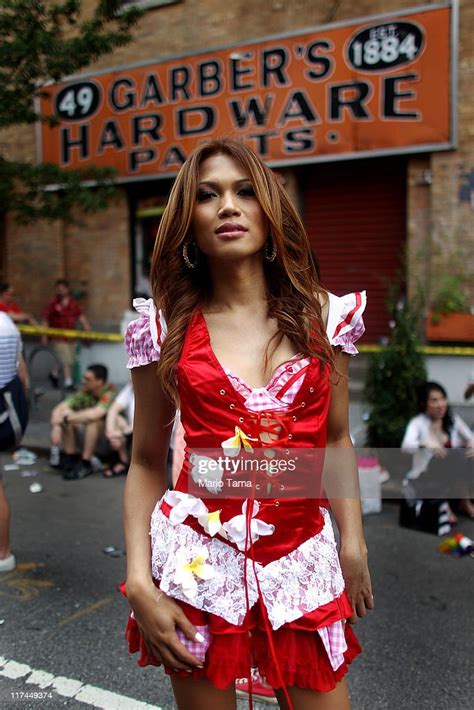 Transgender Reveler Gisele Moore Looks On Following The Gay Pride