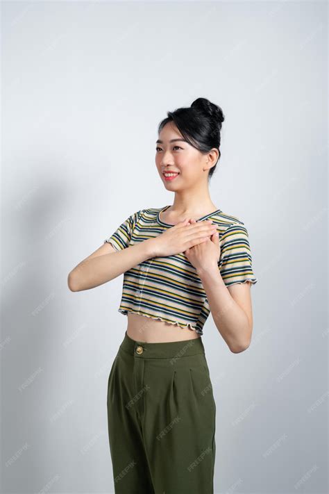 Premium Photo Portrait Of Touched Young Woman Feeling Flattered