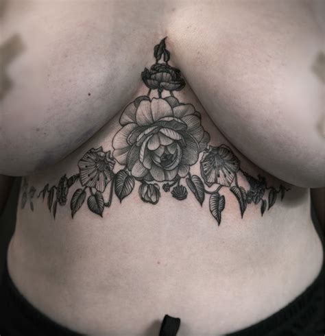 Sternum Piece Going Underneath With Showoff Ink Artistry