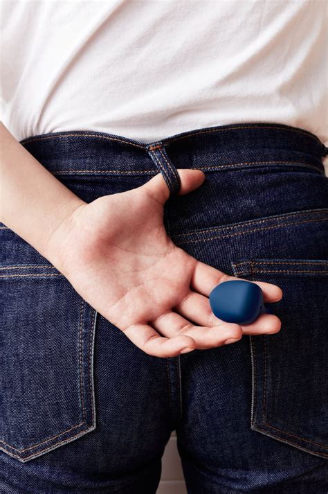 dame s compact fin vibrator slots between two fingers