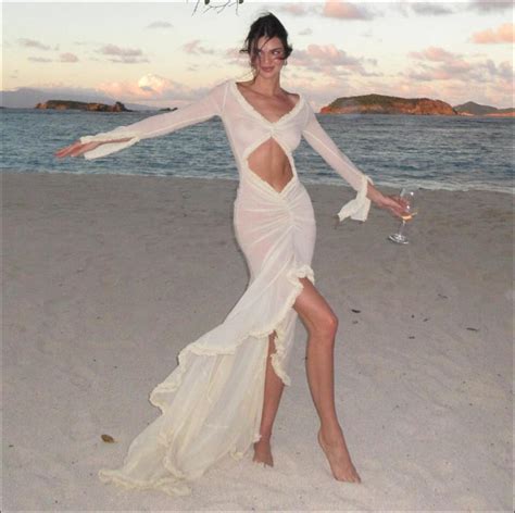 Kendall Jenner Kicks Off 2024 In Helsas Sheer White Gown