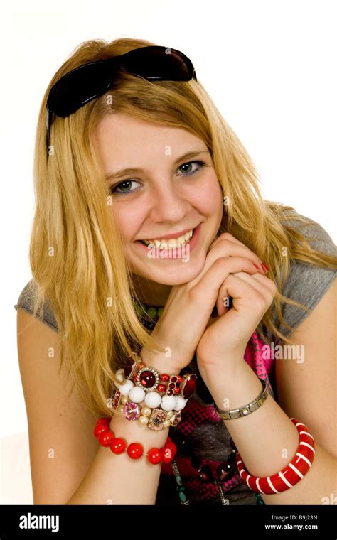 Portrait Of A 13 Year Old Girl Wearing A Lot Of Necklaces Bangles