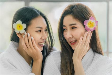 Lgbtq Lesbian Couple Having Romantic Moment Relaxing Together In Spa