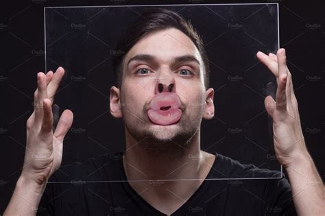 man pressed against glass bizarre high quality people images