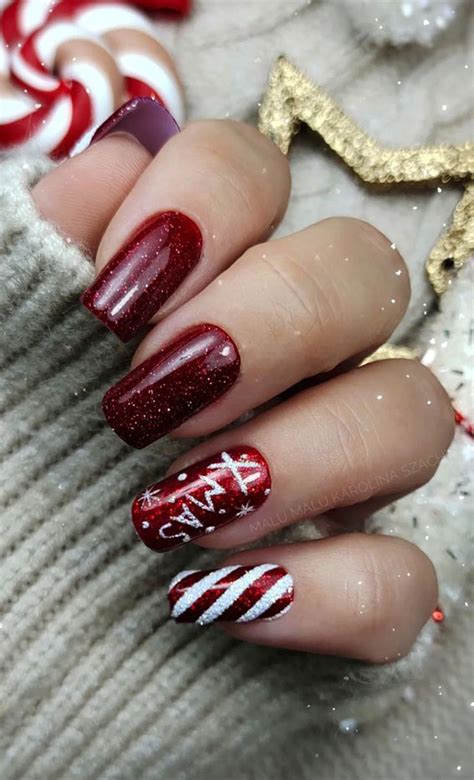50 Festive Holiday Nail Designs And Ideas Snowflake Red Candy Cane Nails