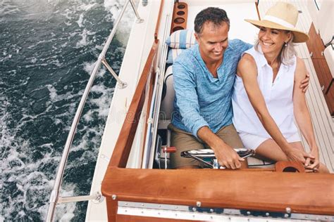 Living The High Life At Sea A Mature Couple Enjoying A Relaxing Boat