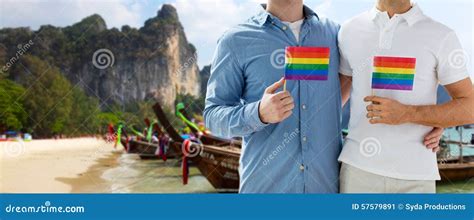 Close Up Of Male Gay Couple With Rainbow Flags Stock Image Image Of