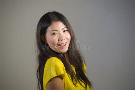 Natural And Fresh Portrait Of Young Happy And Exotic Islander Asian