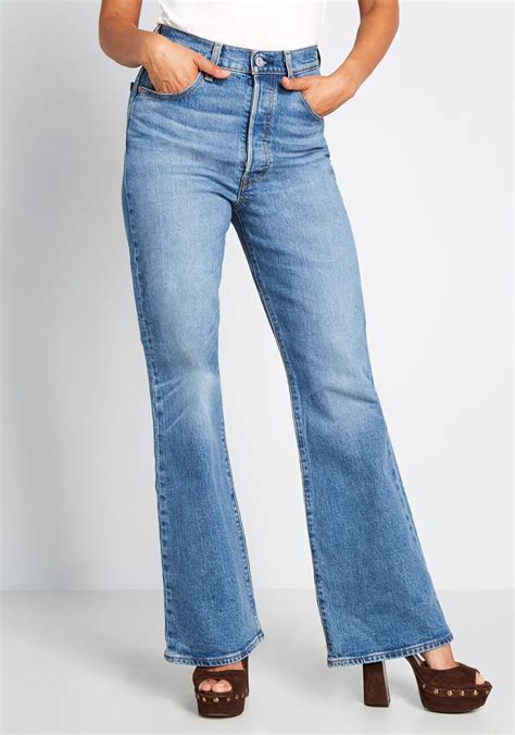 Ribcage Flared Jeans Saunter Through The Fashion District And Beyond