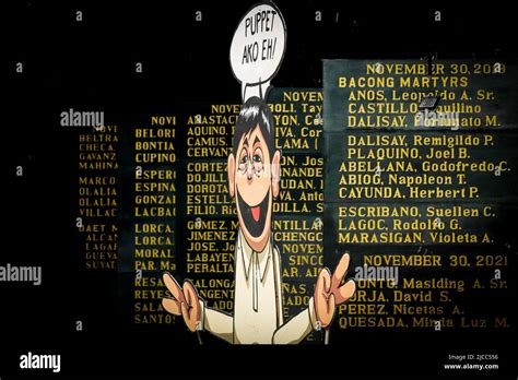 An Effigy Of President Elect Ferdinand Marcos Jr Stands Along With The