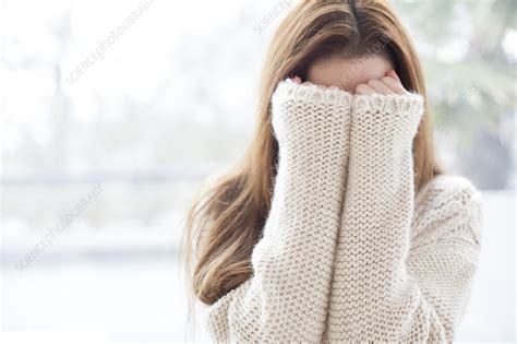 Woman Covering Face Stock Image F009 4995 Science Photo Library