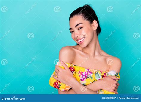 Photo Of Pretty Young Brunette Lady Hug Herself Wear Floral Top