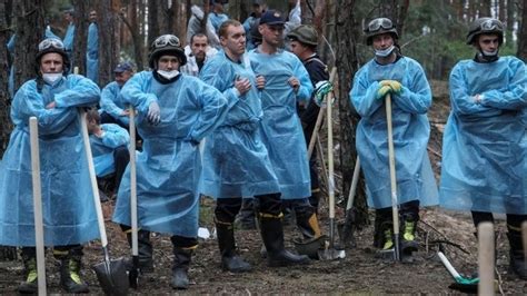 Ukraine War Mass Exhumations At Izyum Forest Graves Site Bbc News