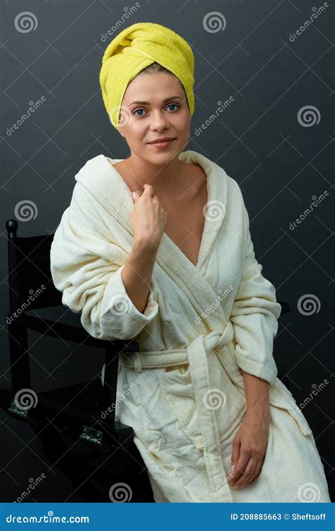 Woman Wearing White Bathrobe Sitting On Black Chair Stock Image Image