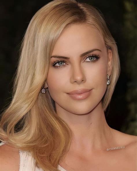 A Woman With Blonde Hair And Blue Eyes