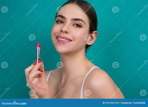 Gorgeous Young Woman In Stylish Makeup Girl Posing With New Lipstick