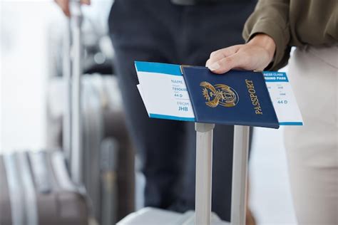 Premium Photo Passport Travel And Airport With The Hand Of A