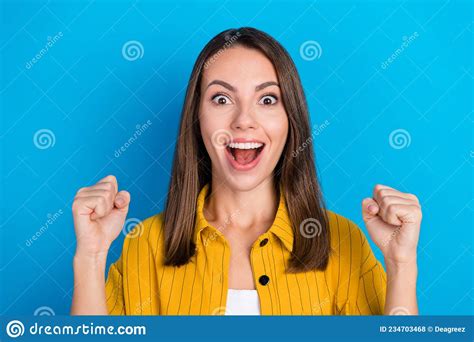Photo Of Hooray Millennial Brunette Lady Hands Fists Wear Yellow Shirt