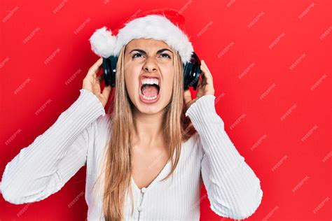 Premium Photo Beautiful Hispanic Woman Wearing Christmas Hat And