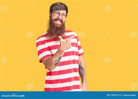 Handsome Young Red Head Man With Long Beard Wearing Casual Clothes