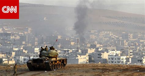 مقاتلون أكراد يطوقون مسلحي داعش داخل كوباني وقتلى بينهم أطفال بقصف