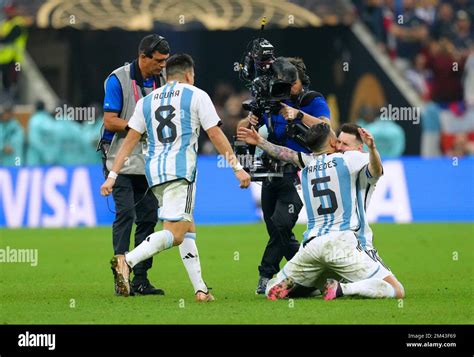 Argentinas Lionel Messi Right Leandro Paredes And Marcos Acuna