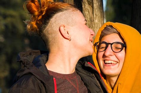 Premium Photo Gay Lesbian Couple Portrait Two Adult Woman In The Park