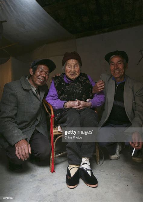 100 Year Old Bound Feet Woman Whose Surname Is Luo Pu Poses For