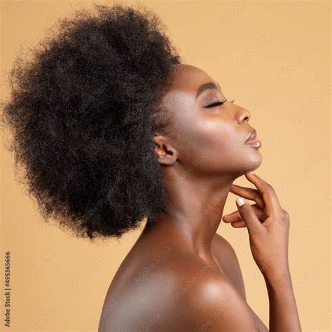 Face Profile Of African Beauty Woman Massaging Face And Neck Dark Skin