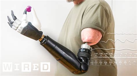 How Mind Controlled Bionic Arms Fuse To The Body Wired Youtube