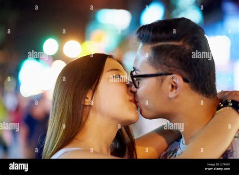 Nothing Is More Special Than The First Kiss A Couple Kissing While Out