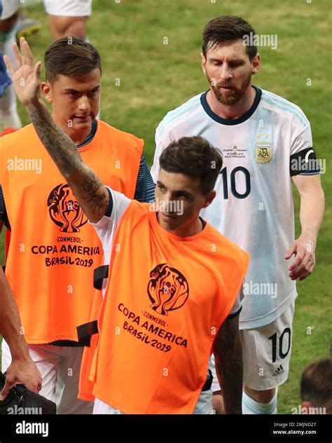 Argentinas Lionel Messi Top Right Leaves The Pitch At The End Of