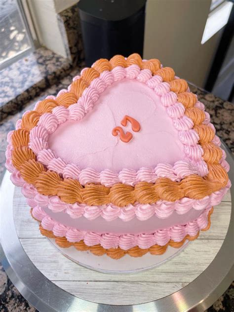 40 Delightful Lambeth Birthday Cake Ideas Brown And Pink Heart Shape Cake