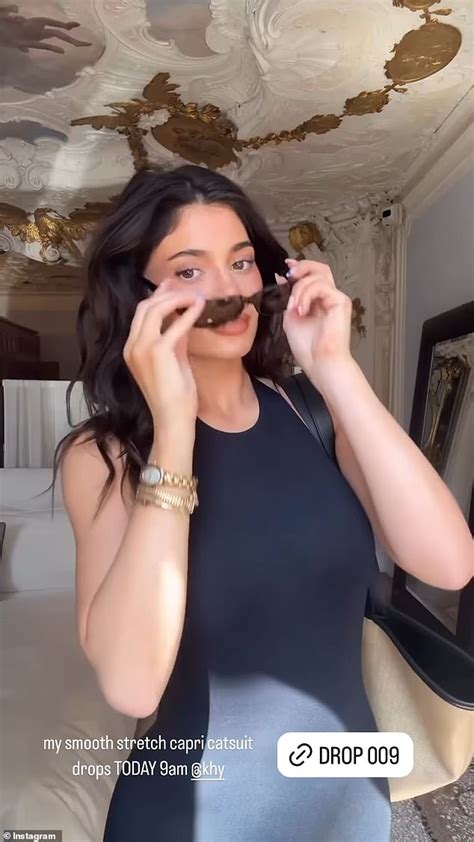 Kylie Jenner Showcases Her Bare Back In Plunging Black Capri Catsuit
