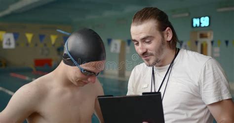 Male Swimming Coach Going By The Swimming Pool Stock Video Video Of