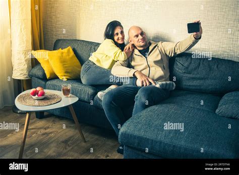 Attractive Young Caucasian Man Taking Self Portrait On Cell Phone
