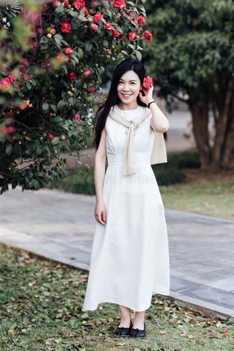 Candid Lifestyle Portrait Of Happy Young Beautiful Asian Woman Enjoying