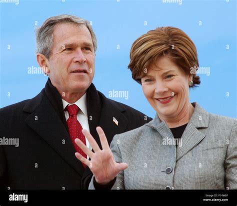 Us President George W Bush And First Lady Mrs Laura Bush Return From