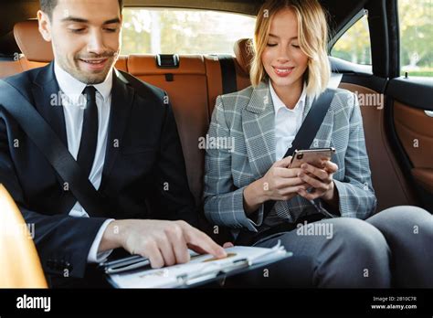 Image Of Young Caucasian Businesslike Man And Woman In Formal Wear
