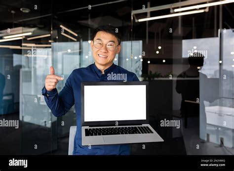 Portrait Of Smiling Successful Asian Man Inside Office Man Smiling And