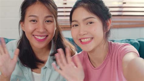 Young Lesbian Lgbtq Asian Women Influencer Couple Vlog At Home Stock